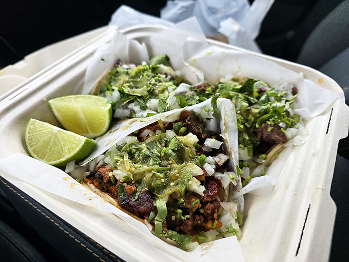 These street-style tacos aren't just food&mdash;they're edible art, with each component precisely arranged and those lime wedges standing by for their crucial supporting role.