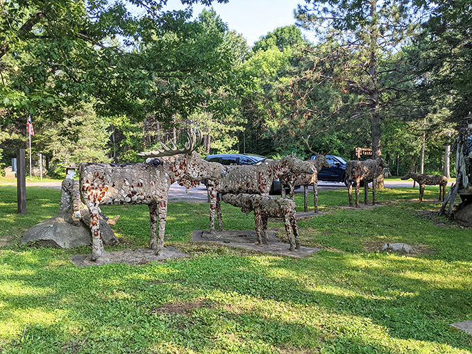These stoic concrete deer have been standing patiently for decades, probably wondering why no one ever offers them apples.