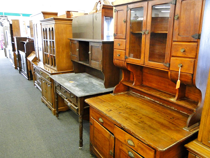 These aren't just cabinets; they're wooden time capsules that have witnessed more family dinners than your grandmother's recipe book.
