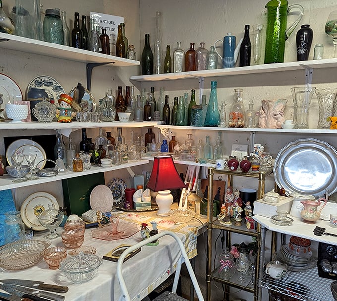 A museum of domestic history displayed on shelves &ndash; each glass piece whispering stories of Sunday dinners and holiday celebrations past.