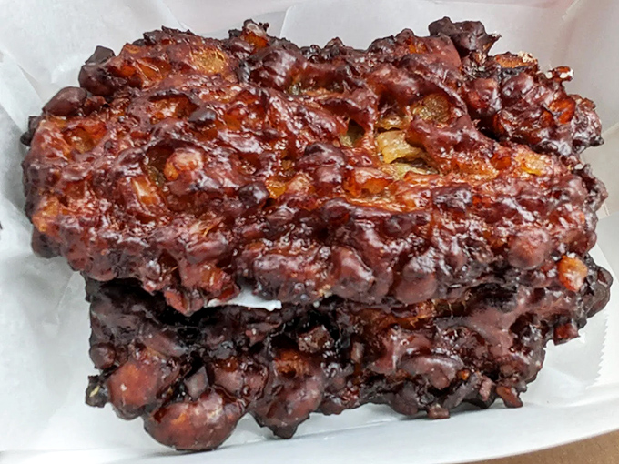 This apple fritter isn't just a donut&mdash;it's a masterpiece of caramelized edges and apple-studded interior that would make Picasso jealous.