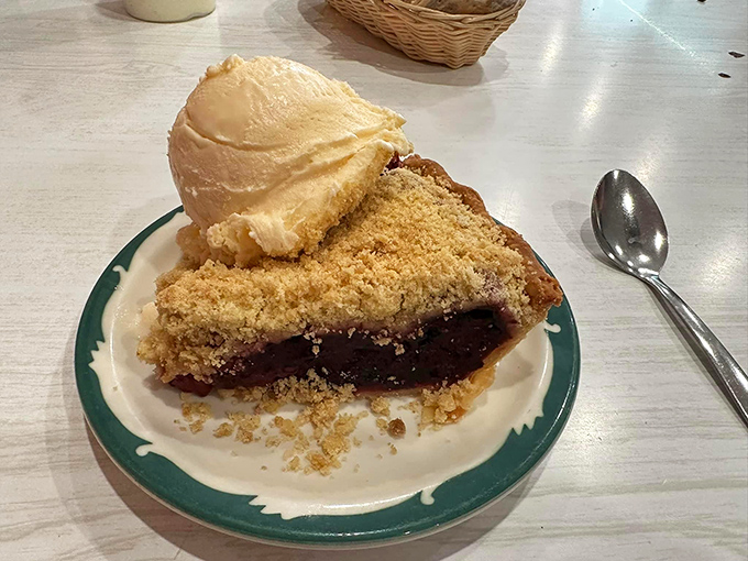 The star of the show takes its final bow&mdash;a slice of berry pie crowned with melting ice cream. Worth every mile of the journey.