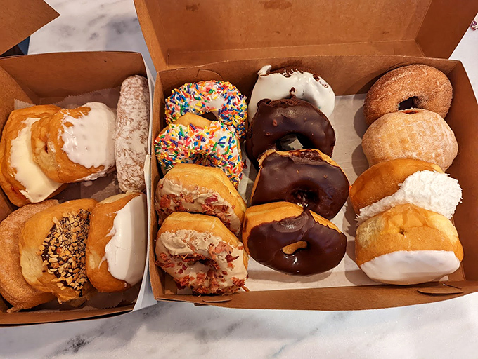 Donut heaven in cardboard form. Each one a different personality&mdash;from sprinkle-covered extroverts to the sophisticated chocolate-glazed intellectuals.
