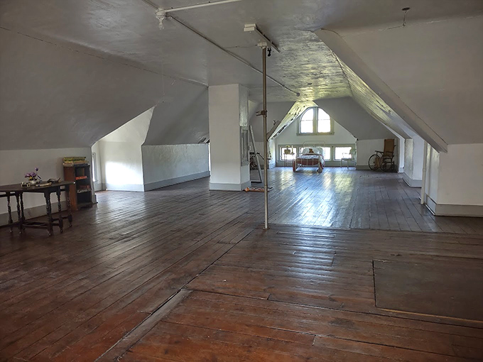 The attic's wooden floors have creaked under countless footsteps. Up here, away from everything, you can almost hear whispers from another era.