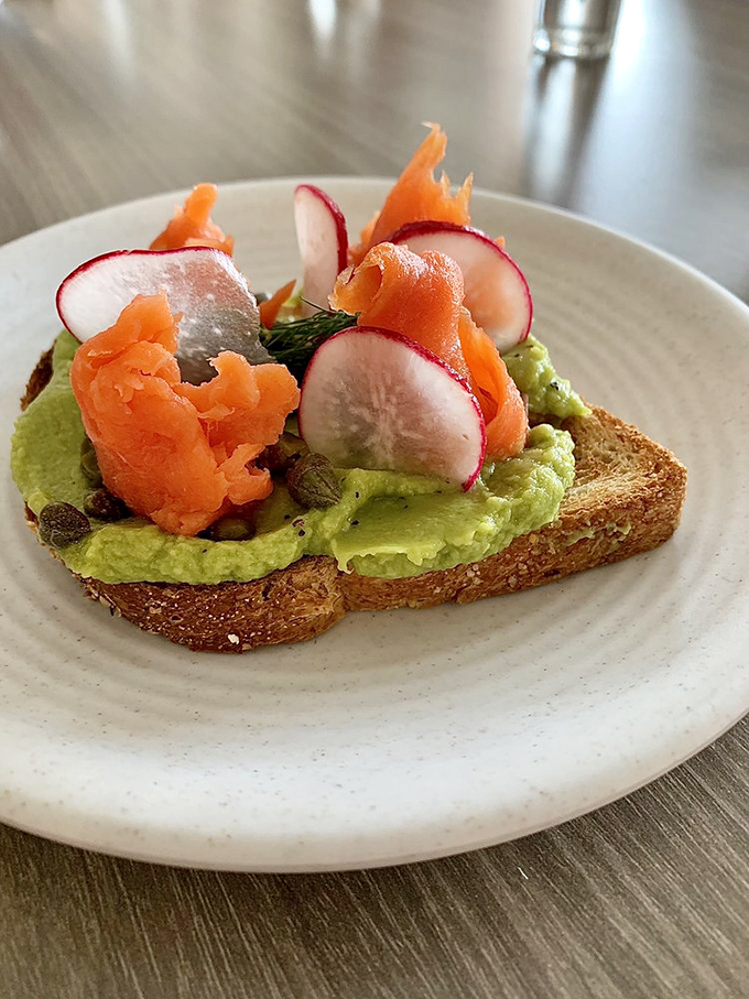 This isn't your basic avocado toast—it's a masterclass in texture and flavor that makes millennials' obsession completely understandable. Worth every penny of your mortgage.