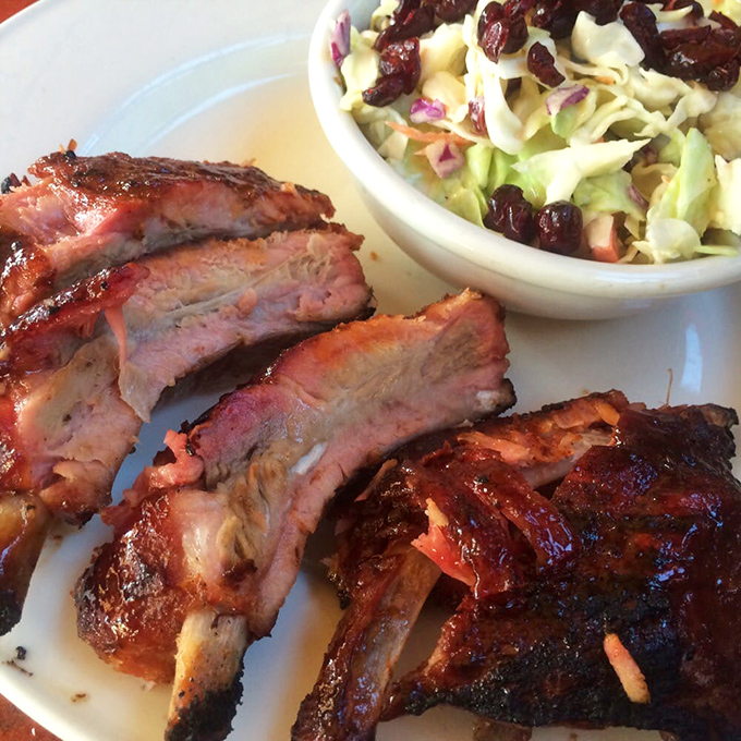 These ribs don't just fall off the bone&mdash;they practically leap onto your fork. That smoke ring is the BBQ equivalent of a Michelin star.