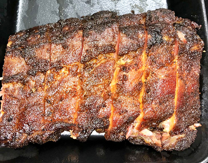 These ribs don't just have a smoke ring&mdash;they've got a full smoke halo. Saints of barbecue, hallowed be thy bark.