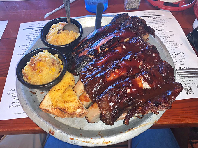 Glistening with sauce and perfectly charred, these ribs don't just fall off the bone—they practically leap into your mouth.