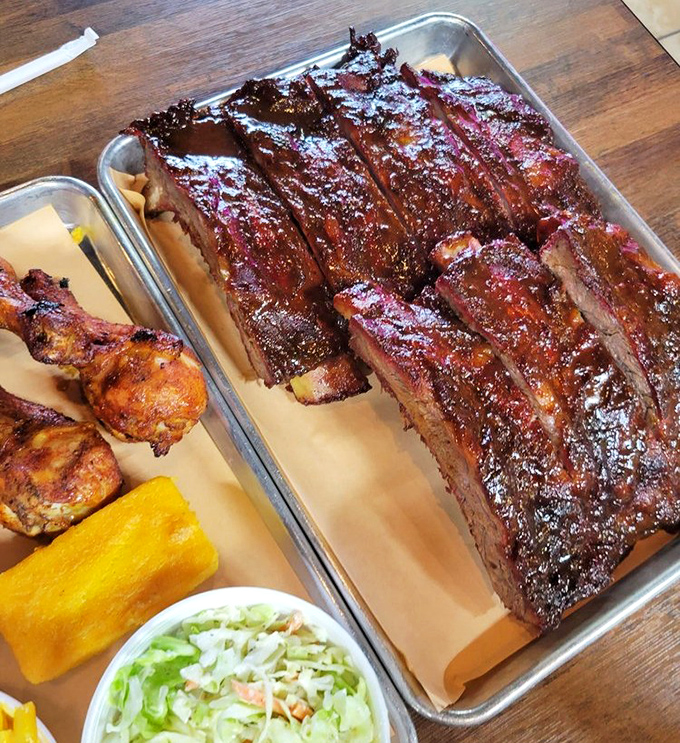 Behold the star attraction: ribs with a bark so perfect they should be in a museum. That smoke ring isn't just pink&mdash;it's practically neon, announcing "This is how it's done."