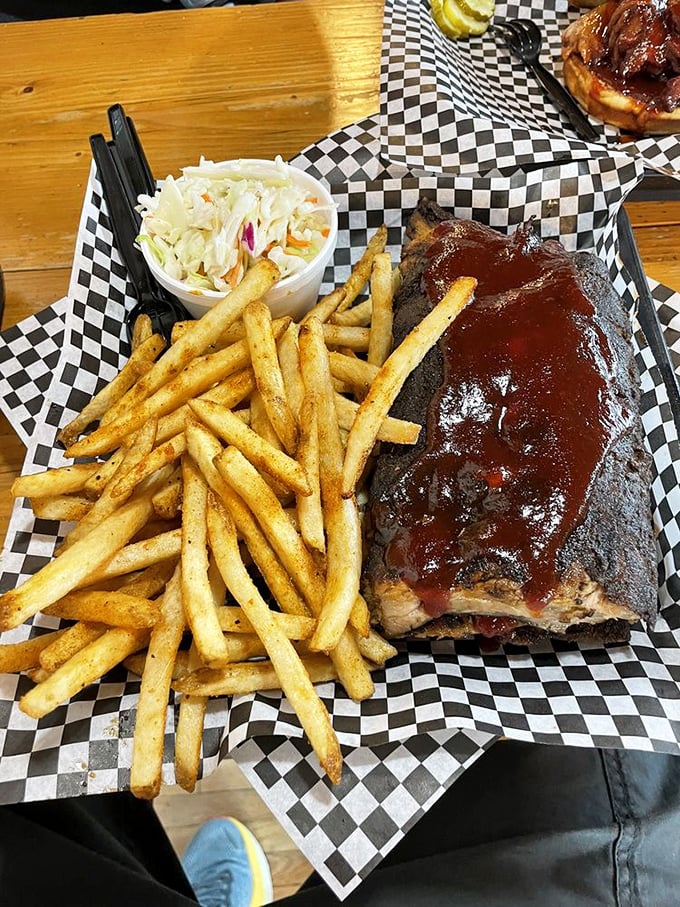 These aren't your dainty, eat-with-a-fork ribs. This is roll-up-your-sleeves, grab-extra-napkins, prepare-to-get-messy barbecue that makes vegetarians question their life choices.