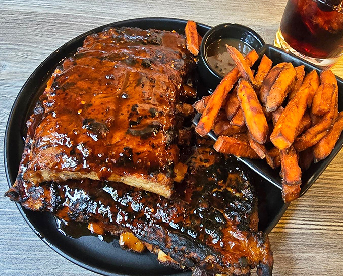 Fall-off-the-bone ribs that make you question every relationship you've ever had. Those sweet potato fries aren't sidekicks&mdash;they're co-stars in this delicious drama.