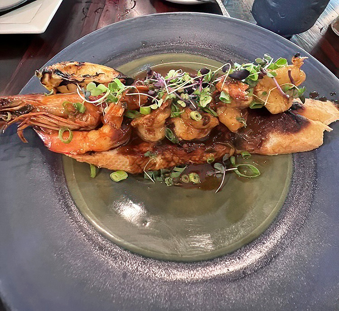 BBQ shrimp so perfectly glazed, you'll want to frame the plate before devouring every last morsel and sopping up that sauce.