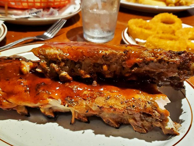 Fall-off-the-bone isn't just a description&mdash;it's a promise kept. These ribs have spent more time perfecting themselves than most of us spent learning algebra.