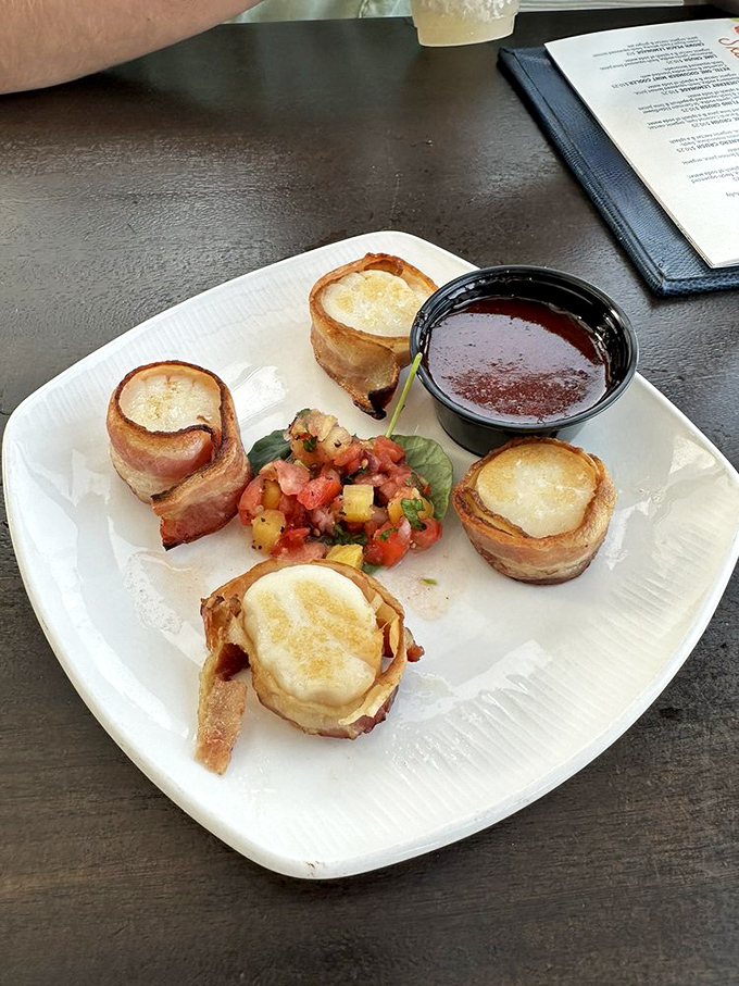 Bacon-wrapped sea scallops that could start a family feud &ndash; perfectly seared, wrapped in Applewood-smoked bacon, with a bright pineapple-tomato salsa that sings.