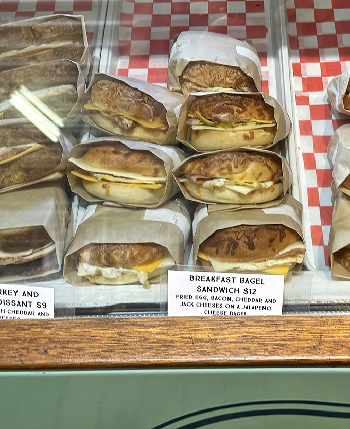 Behold the sandwich that launched a thousand return trips - layers of perfection between toasted bagel halves.