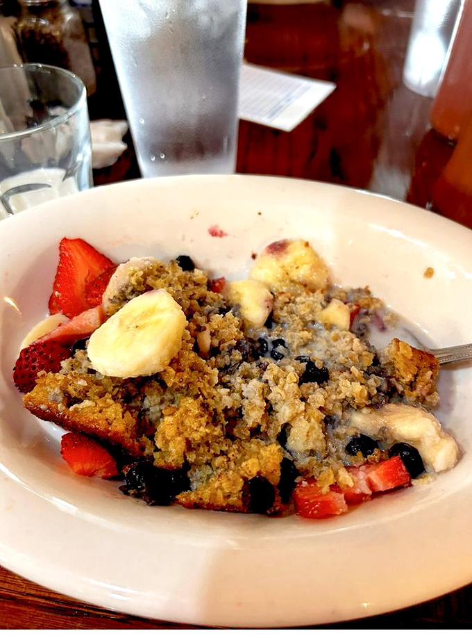 Baked oatmeal that makes ordinary breakfast cereal look like punishment. Fresh fruit and crumble topping transform this humble grain into morning dessert.