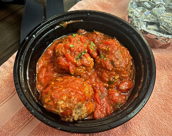 Behold the stars of the show - meatballs so tender they practically melt before your fork arrives.