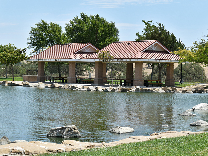 Lakeside pavilions offer peaceful respite from wine tasting, where families picnic and couples stroll along the water's edge.