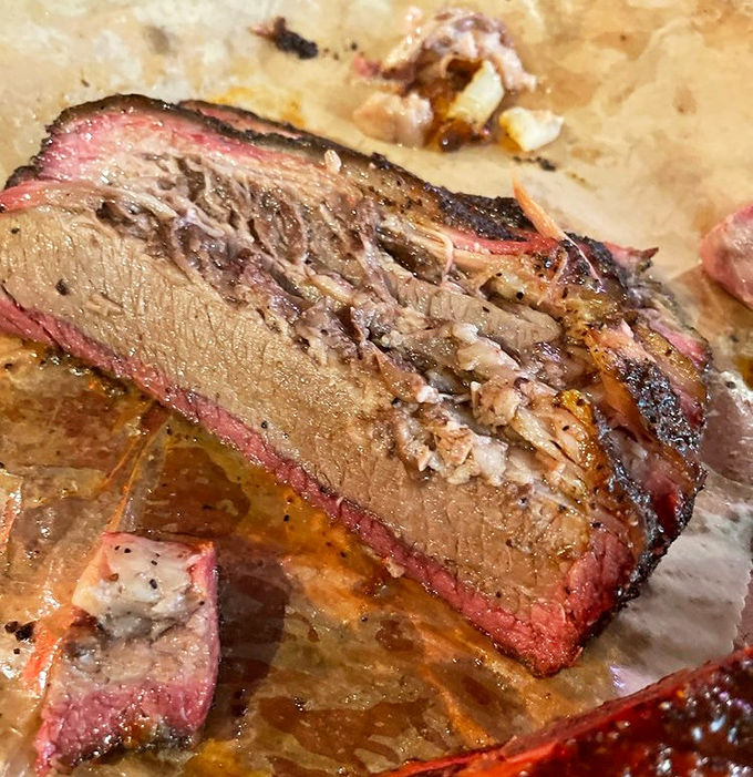 That smoke ring's pinker than a flamingo at sunset, and twice as Instagram-worthy.