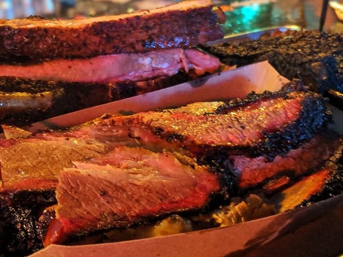 This isn't just brisket; it's edible poetry written in smoke rings and perfect bark.