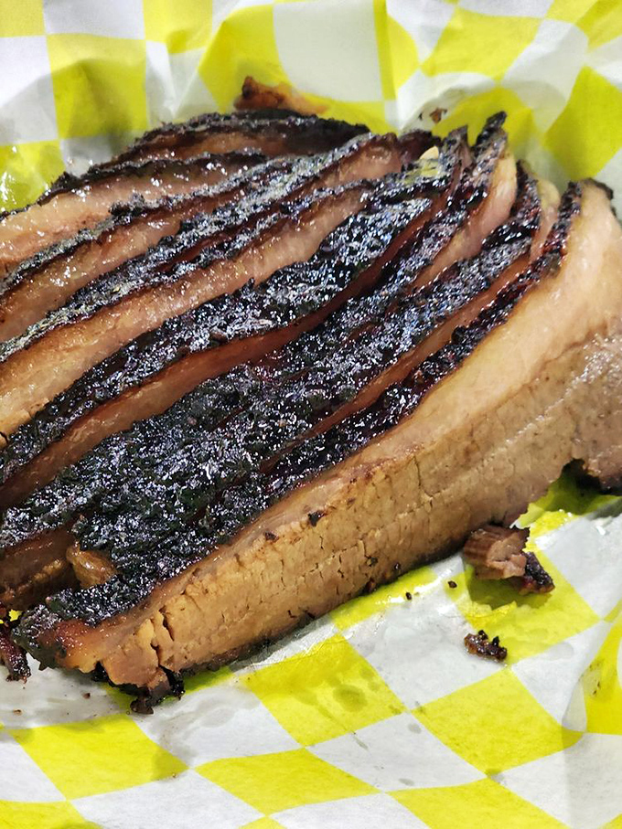 Behold the brisket in all its glory&mdash;that bark, that smoke ring, that perfect slice that practically whispers "I've been waiting for you."
