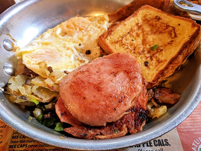 Behold the star of the show&mdash;hickory-smoked brisket with golden home fries and toast. This is what food dreams are made of.
