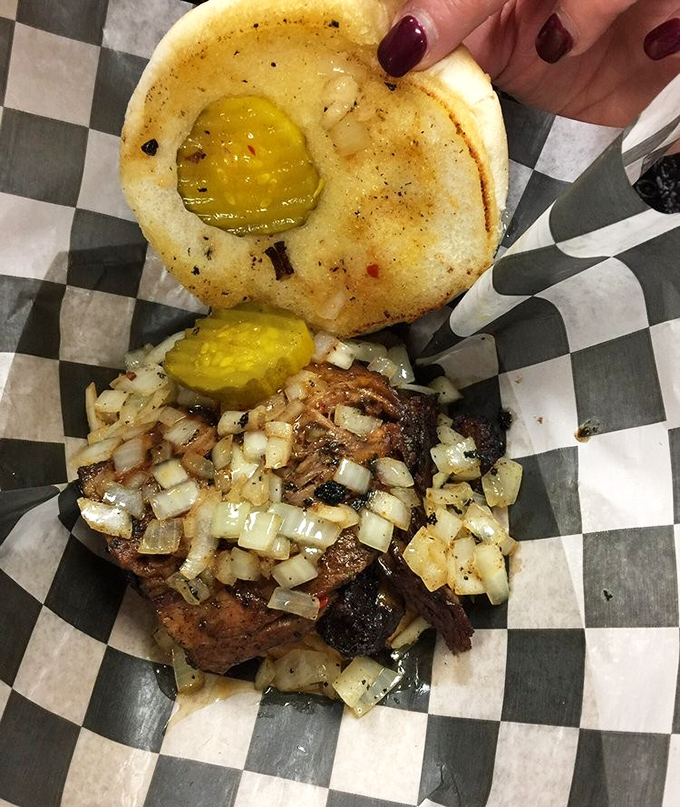 Meat that's clearly been introduced to smoke and fire on intimate terms, served with pickles that add the perfect tangy counterpoint.