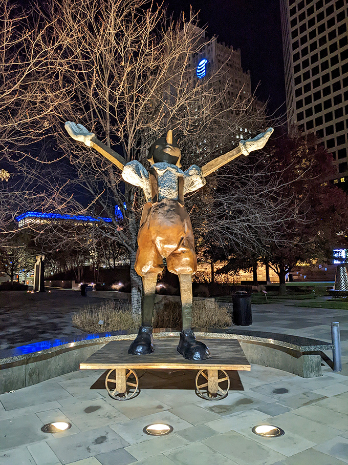 Nighttime transforms this Pinocchio-inspired figure into something magical. Illuminated against St. Louis' skyline, he seems ready to tell tall tales to late-night visitors.