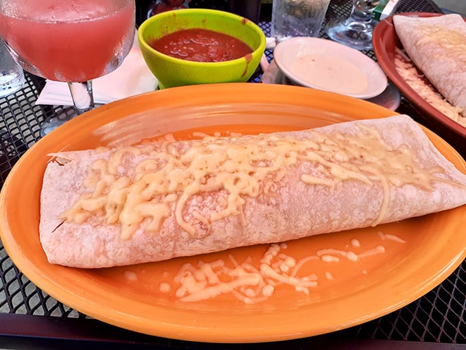 This burrito isn't just a meal, it's an event. Melted cheese blankets a perfectly wrapped tortilla fortress guarding treasures within.