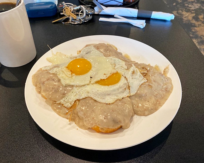 Biscuits smothered in creamy sausage gravy, topped with sunny-side-up eggs&mdash;this is what breakfast dreams are made of, folks.