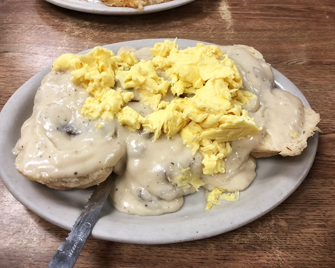 Biscuits and gravy that would make your Southern grandmother weep with joy. The scrambled eggs aren't just a side&mdash;they're the perfect yellow mop for that peppery gravy lake.