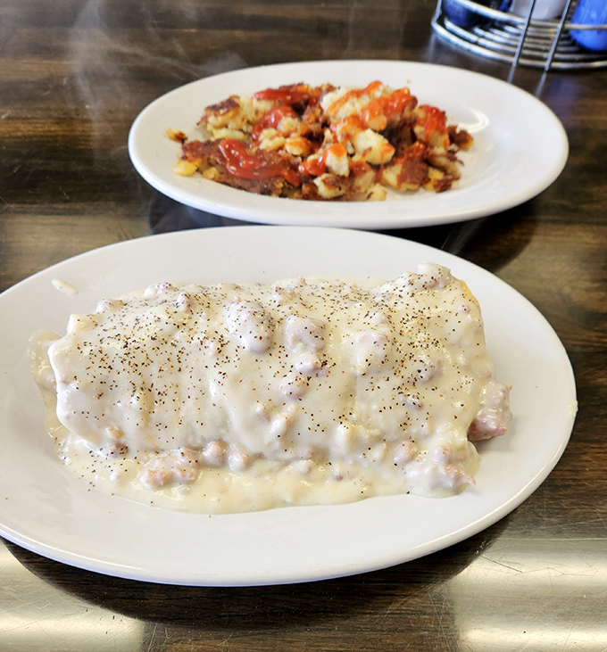 Behold the holy grail of diner breakfasts! This pepper-flecked gravy blanket doesn't just cover the biscuit&mdash;it tucks it in and reads it a bedtime story.