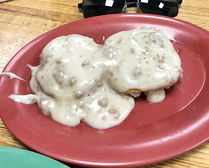 Behold the holy grail of comfort food: biscuits smothered in sausage gravy so good it could make a vegetarian question their life choices.