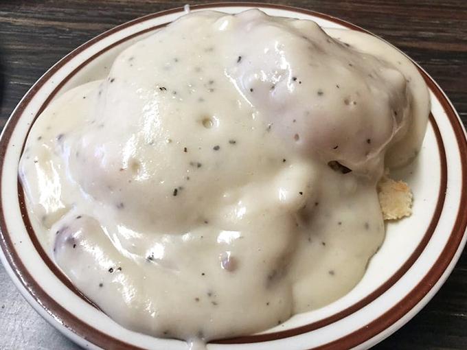 Behold the legendary biscuits and gravy&mdash;a peppery, sausage-studded masterpiece that's converted more vegetarians than a bacon shortage.