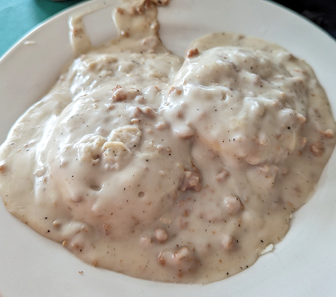 Behold the star attraction: Jimmy's legendary biscuits and gravy. That pepper-flecked cream sauce isn't just breakfast&mdash;it's edible therapy on a plate.