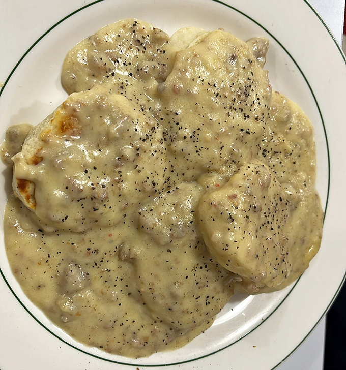 Behold the holy grail of diner breakfasts&mdash;biscuits and gravy with enough black pepper to wake you up faster than the coffee. Comfort food that hugs you from the inside.