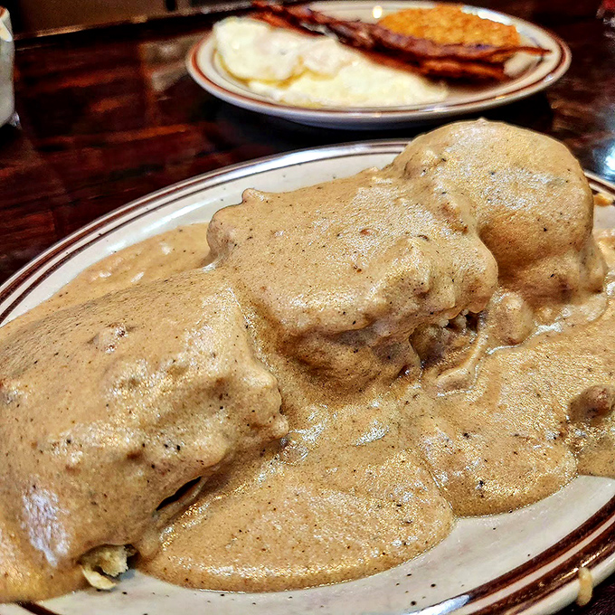 Behold the famous biscuits drowning in creamy sausage gravy that dreams are made of.