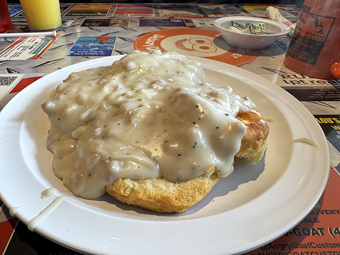 Biscuits and gravy that doesn't know when to quit. This cloud of peppery sausage gravy could make a grown Floridian weep with joy.