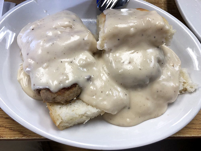 Biscuits and gravy that could make your grandmother weep with joy. That peppery cream gravy blankets those fluffy biscuits like a warm Southern hug.
