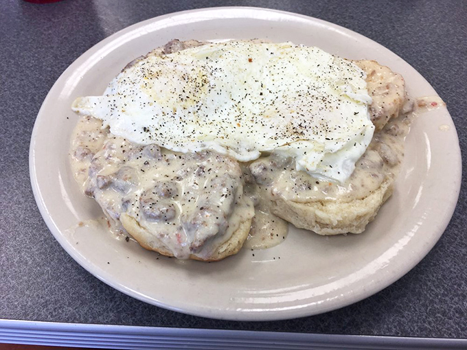 Biscuits and gravy that would make your Southern grandmother nod in approval. The pepper-speckled gravy blankets those biscuits like a comforting hug.