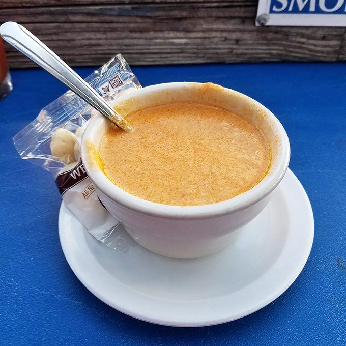 This lobster bisque isn't just soup; it's a creamy, amber-hued revelation that might make you consider moving to Deerfield Beach permanently.