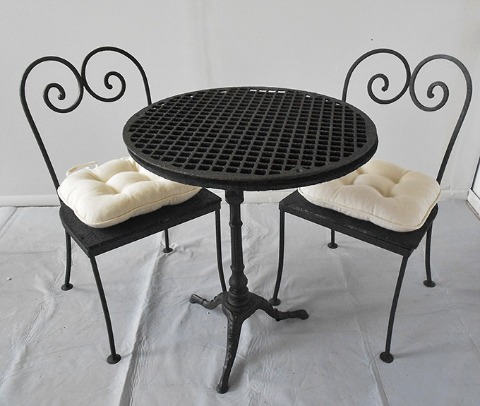 This isn't just a bistro set&mdash;it's the perfect spot for your morning coffee and crossword ritual. Scrollwork that would make Parisian caf&eacute;s jealous.