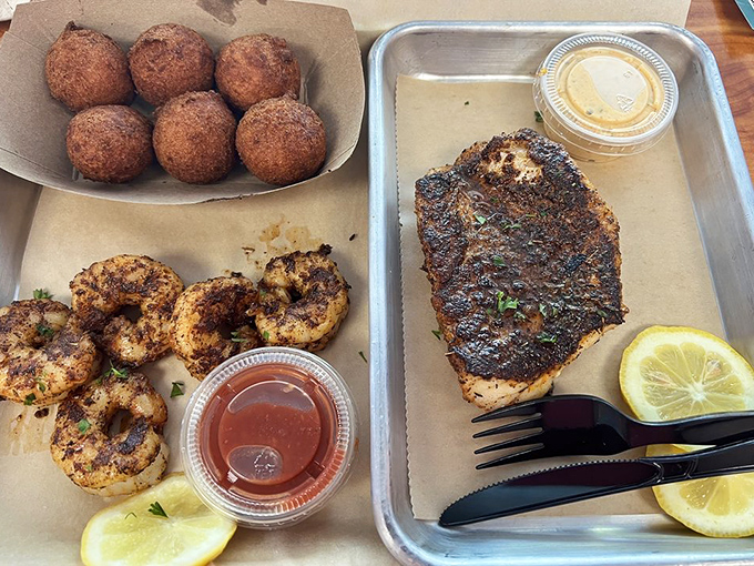 Blackened grouper and shrimp that look like they jumped from the Gulf to your plate. The seasoning alone deserves its own fan club.