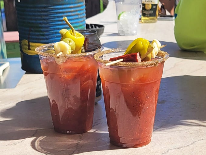 These Bloody Marys aren't just drinks, they're architectural achievements. Garnished to perfection and spiced with the promise of an unforgettable afternoon.