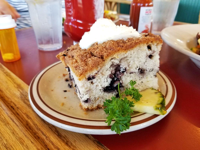 The legendary blueberry coffee cake that launched a thousand morning commutes. That streusel topping deserves its own fan club.