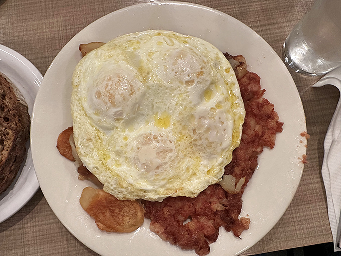 Eggs that look like they were laid this morning, hash browns with the perfect crisp-to-tender ratio. This is breakfast architecture at its finest.