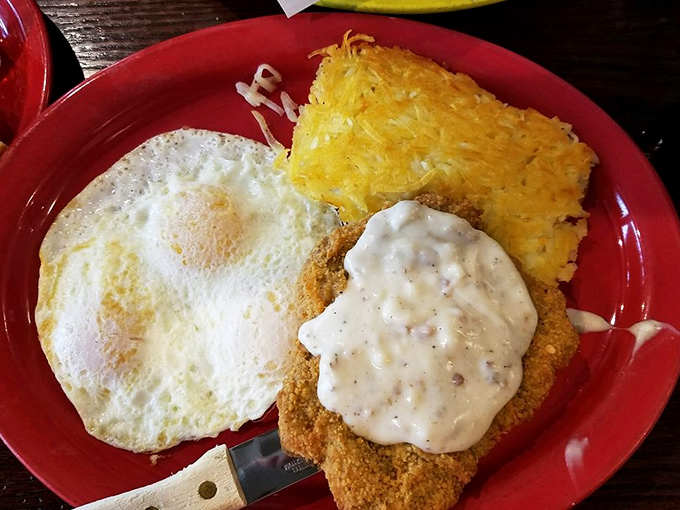 Country-fried comfort meets morning sunshine. That creamy gravy is practically begging you to cancel your afternoon plans for a nap.