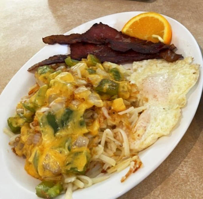 Western omelets should all aspire to this level of greatness&mdash;cheese cascading over perfectly diced peppers while bacon stands at attention like a delicious honor guard.
