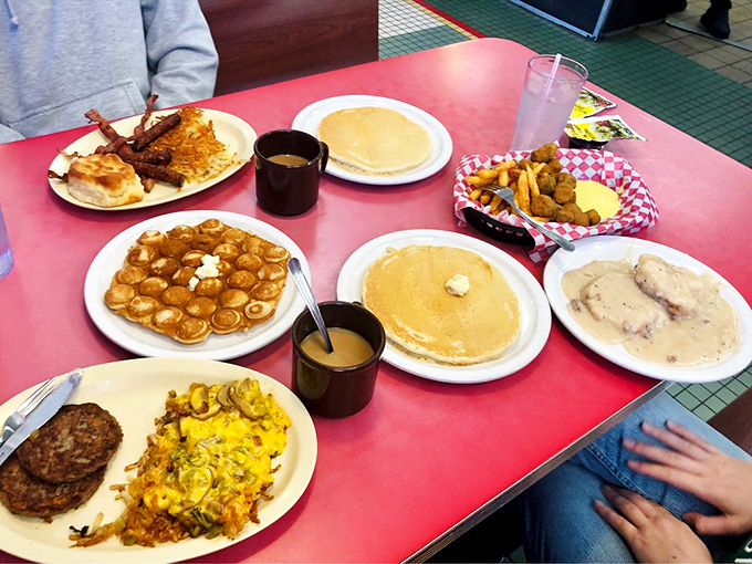 Breakfast nirvana achieved! Golden pancakes, crispy hashbrowns, and biscuits with gravy&mdash;a spread that makes morning people of us all.