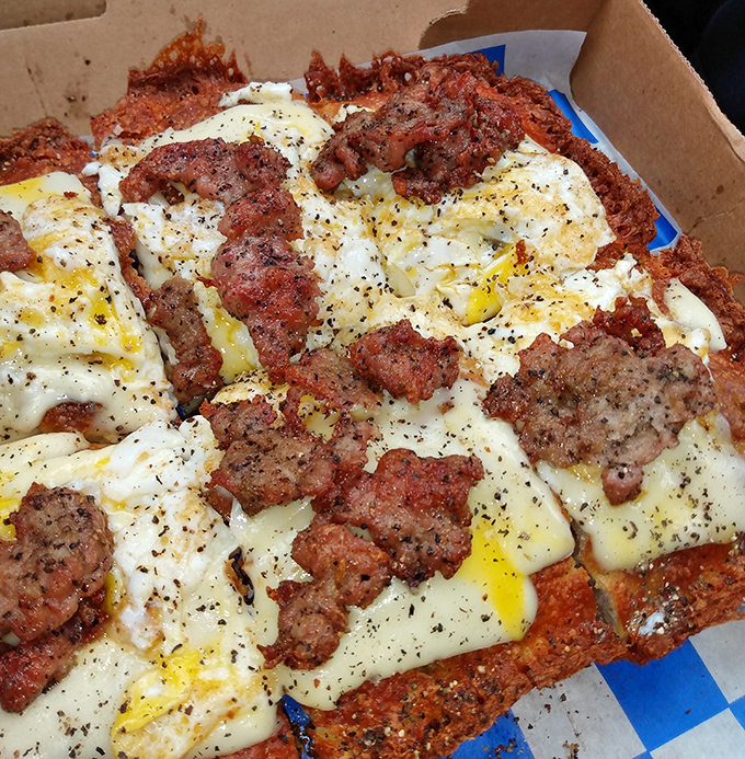 Breakfast pizza: where morning meets midnight cravings in a glorious union that makes you wonder why we ever settled for cereal.